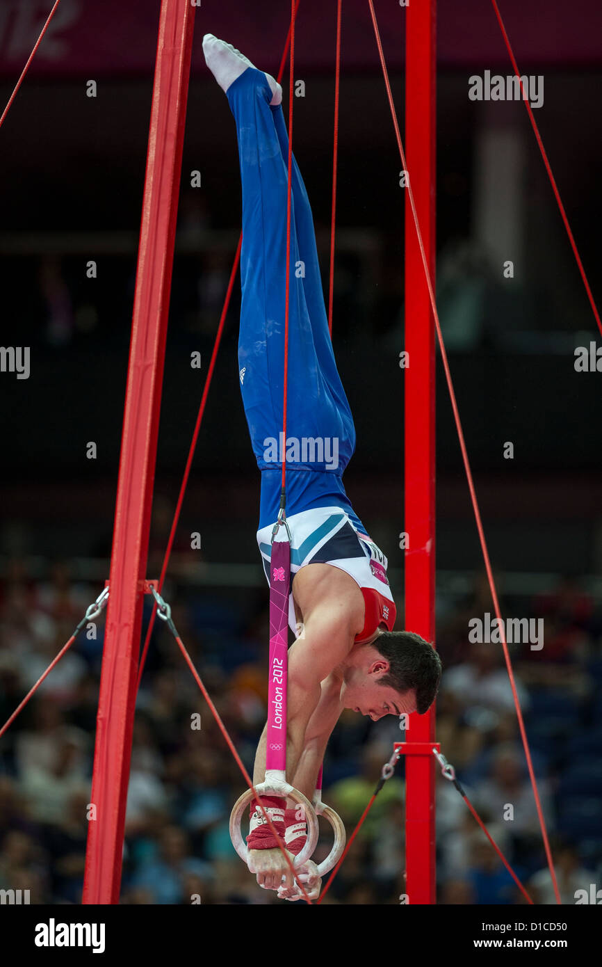 Kristian Thomas (GBR) competing on the rings during the Men's ...