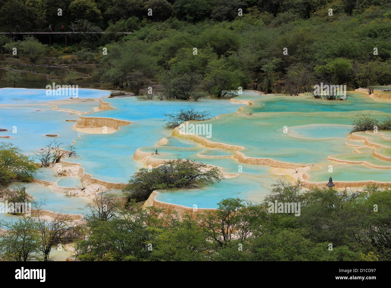 Pools formed by calcite deposits in Huanglong nature reserve literally ...