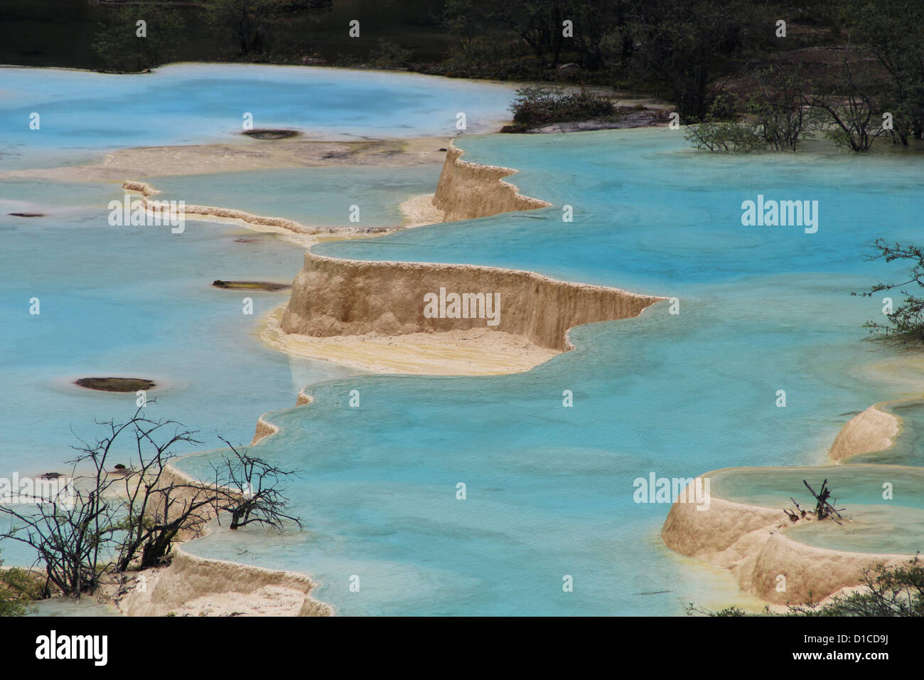 Pools formed by calcite deposits in Huanglong nature reserve literally ...