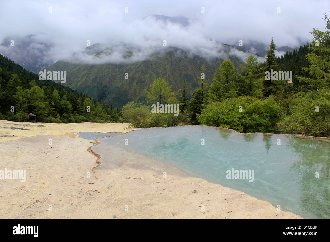 Pools formed by calcite deposits in Huanglong nature reserve literally ...