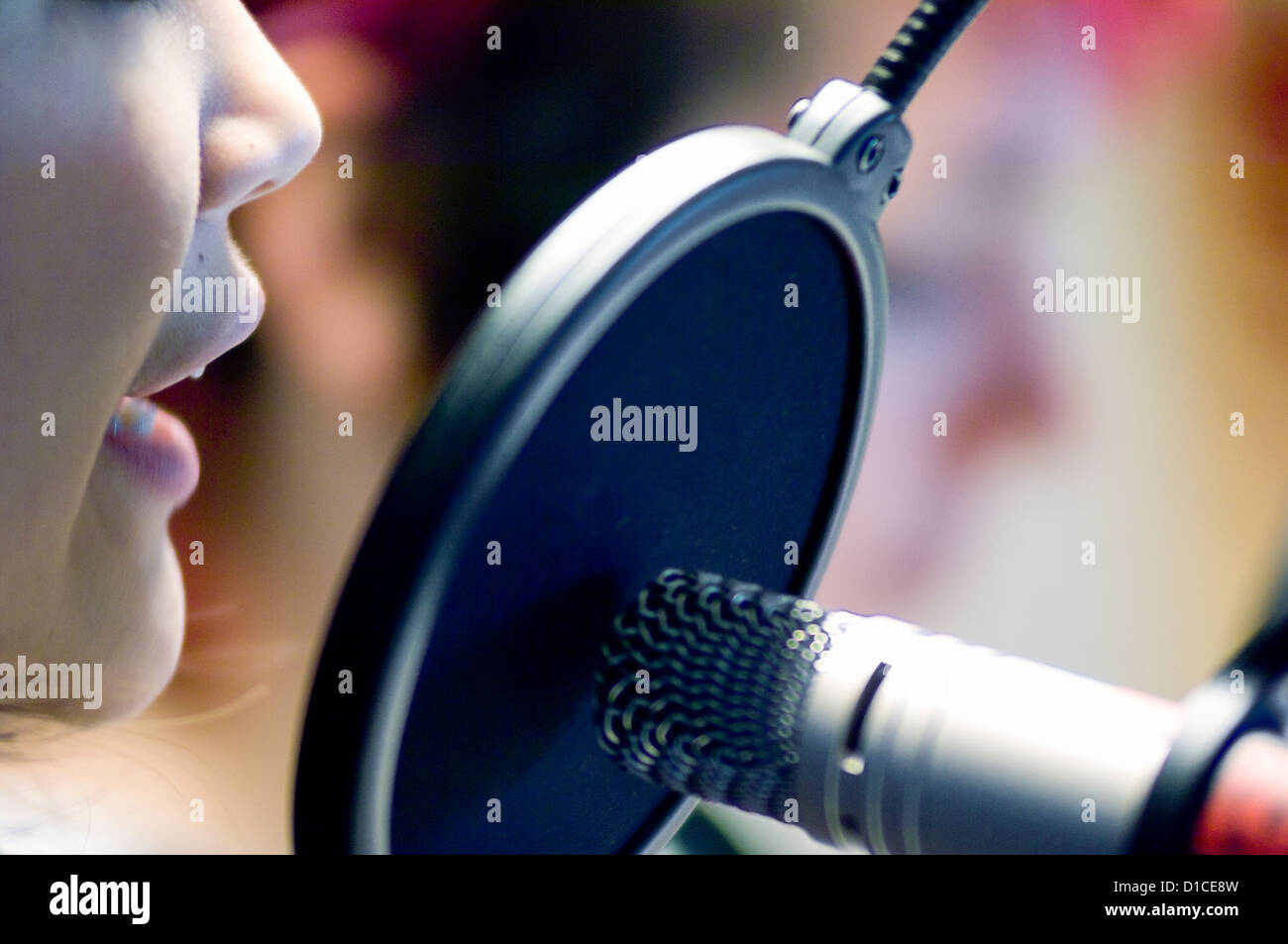 Female radio speaker at microphone Stock Photo - Alamy
