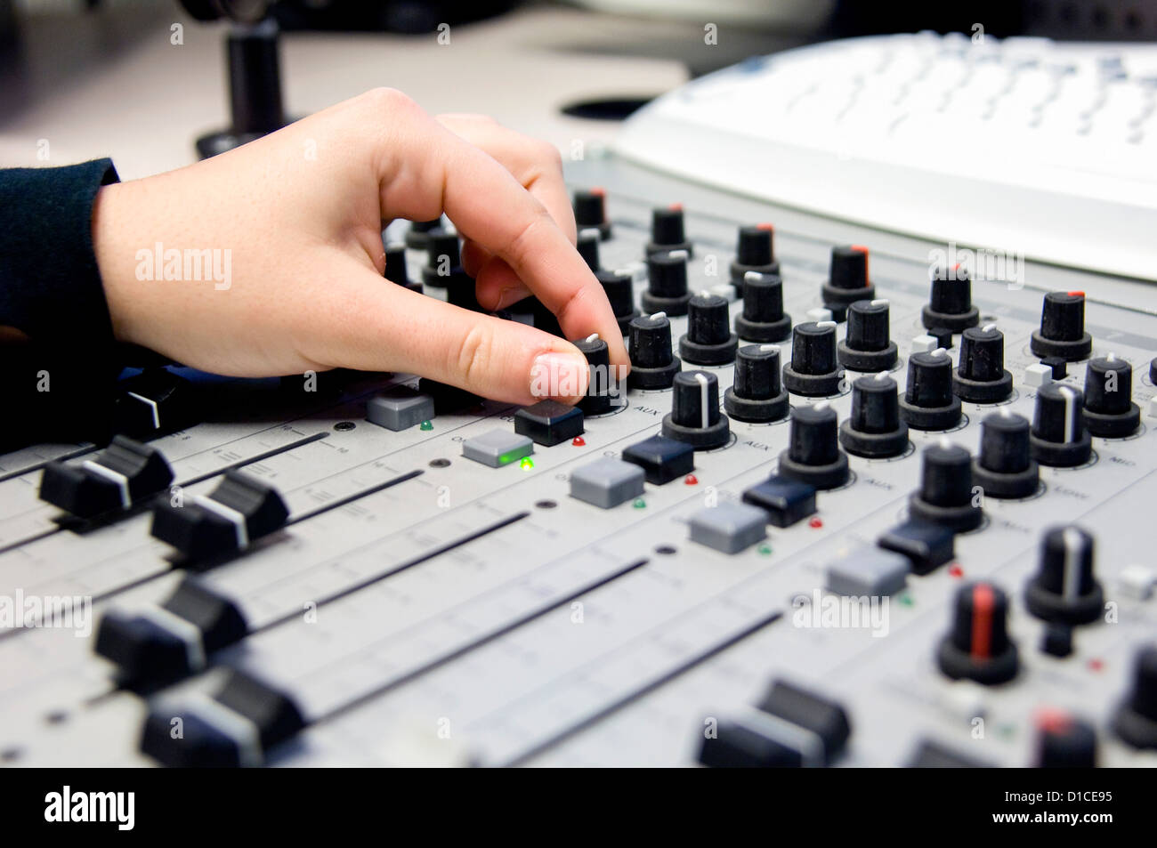 mixer console with hand Stock Photo - Alamy