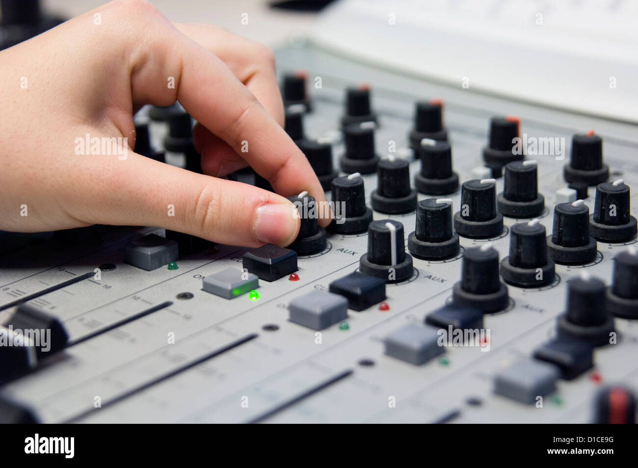 mixer console with hand Stock Photo - Alamy