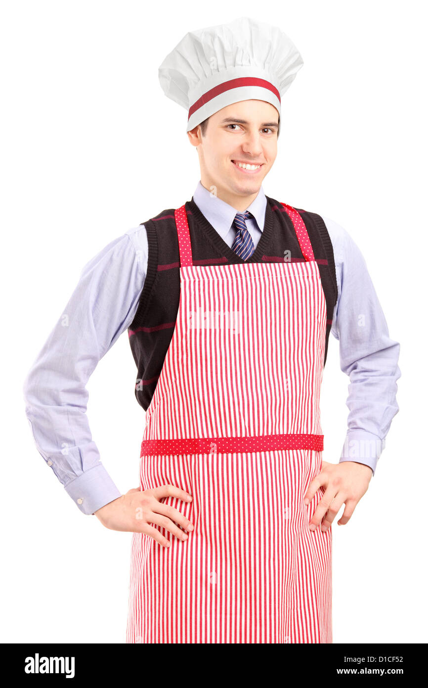 A smiling guy with cooking hat and apron posing isolated against white ...