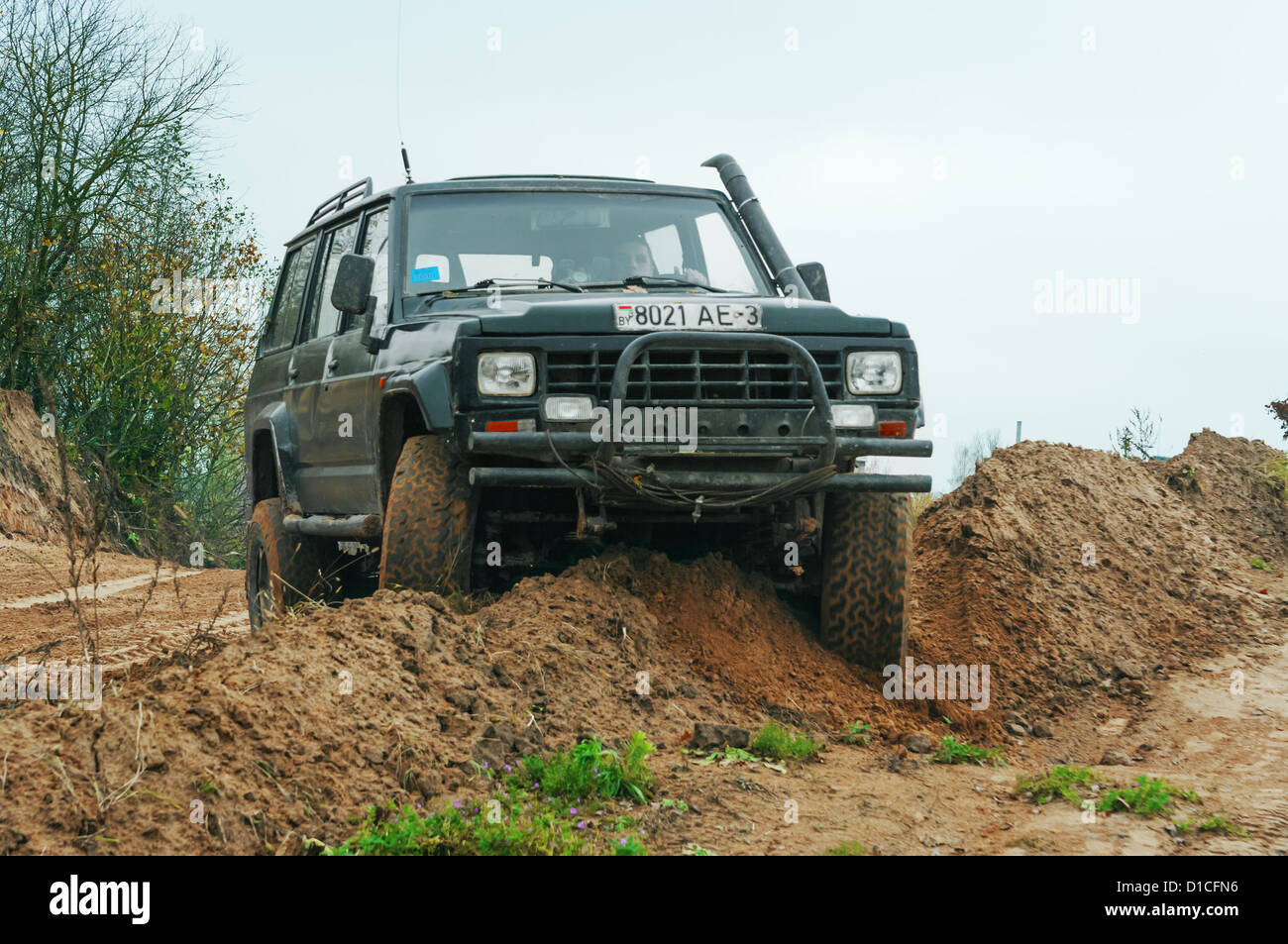 The car of judges crossing a sandy border of the racing route. Episode ...