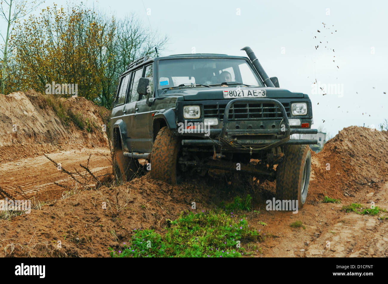 The car of judges crossing a sandy border of the racing route. Episode ...