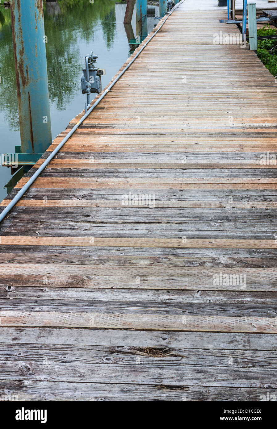 An old boardwalk used to dock boats Stock Photo - Alamy