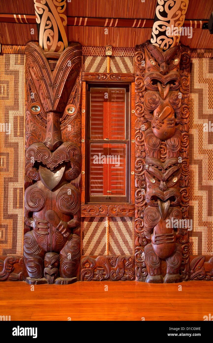 Carved Traditional Maori Figure, called Poupou, supporting the overhead ...