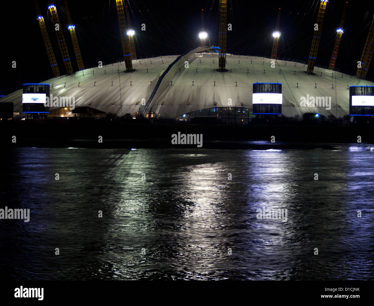 Night view of the 02 Arena showing River Thames in foreground, North ...