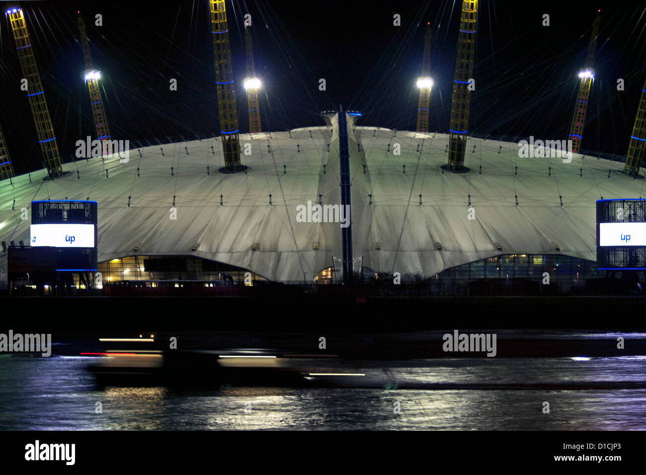 Night view of the 02 Arena showing River Thames in foreground, North ...