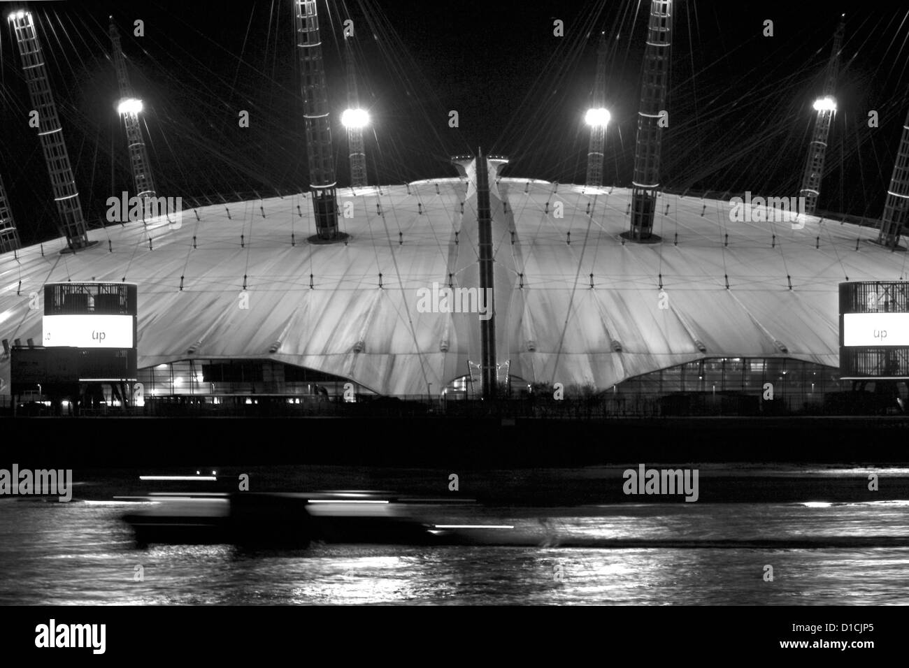 Night view of the 02 Arena showing River Thames in foreground, North ...