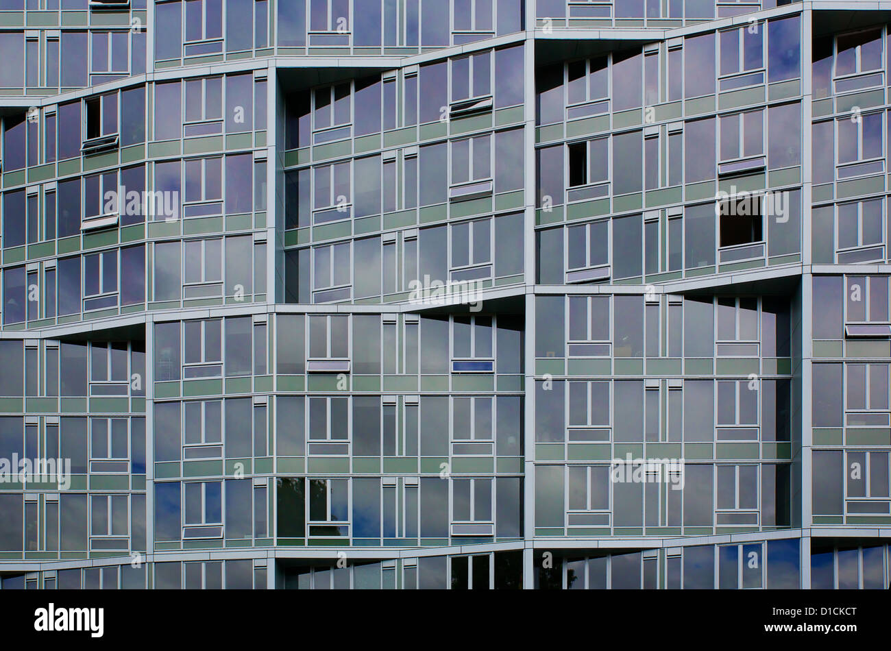 Irregular shapes of an office building facade of windows Stock Photo ...