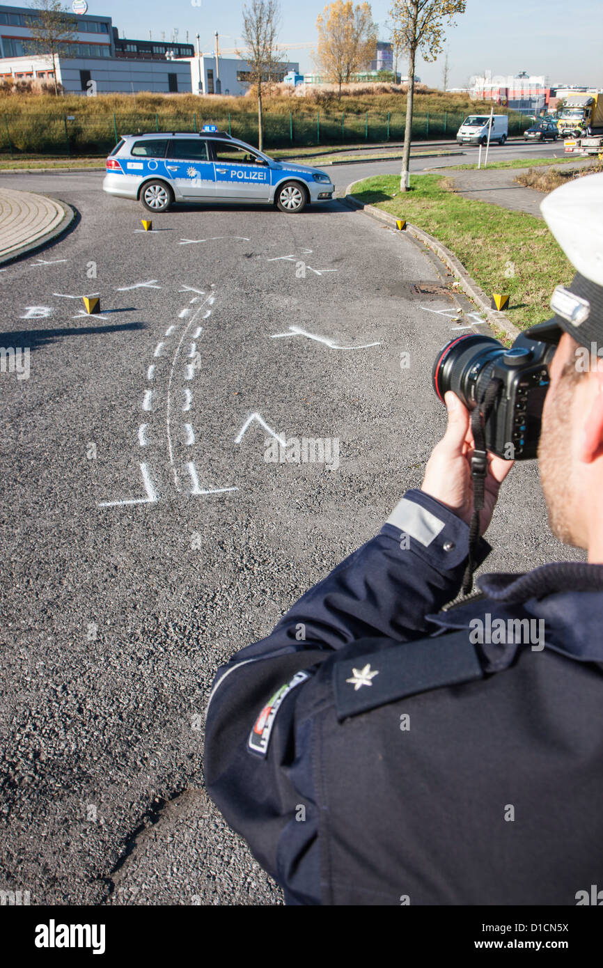 Police secures evidences and traces after a car crash Stock Photo - Alamy