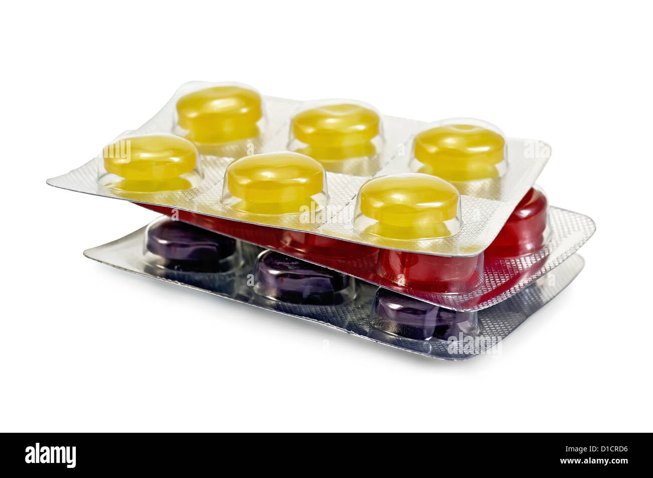 A stack of three packages of cough pills in different colors isolated ...