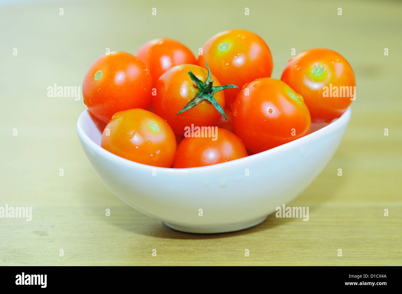 Small round tomato hi-res stock photography and images - Alamy