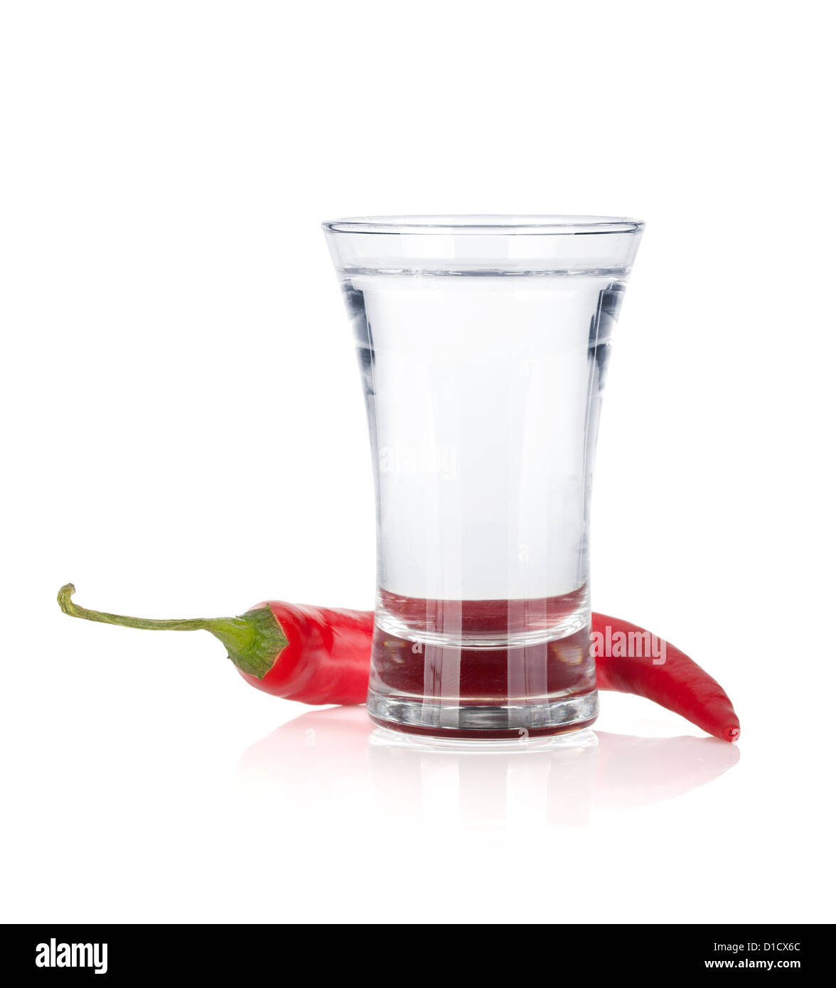 Shot of vodka and red hot chili pepper. Isolated on white background ...