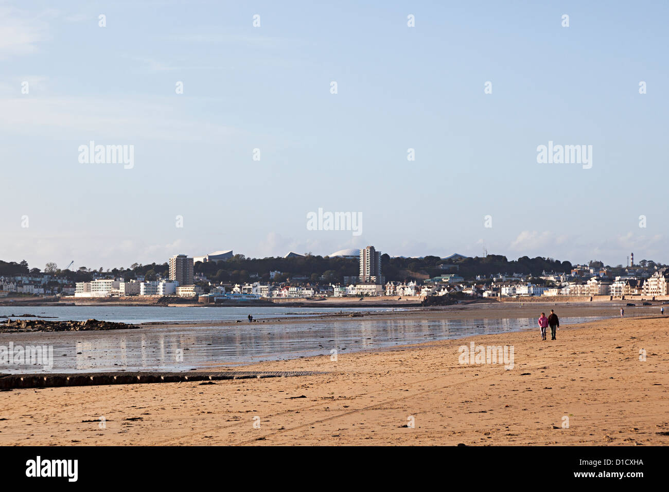 Walking on the Samares beach near St Helier, Jersey, Channel islands ...