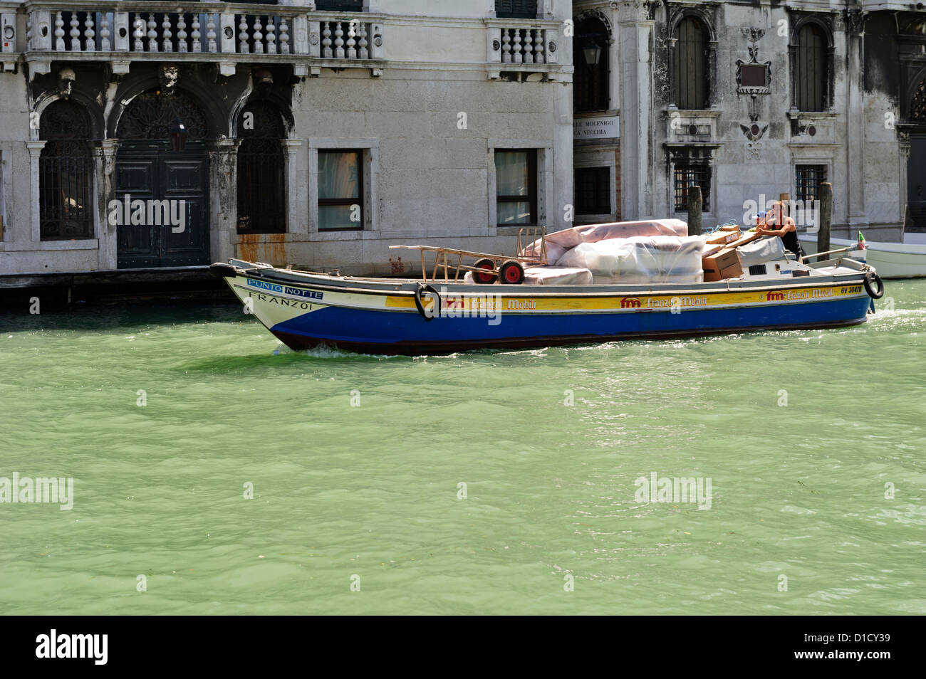 Barge traveling on the Venetian Canal, Venice, Italy Stock Photo - Alamy