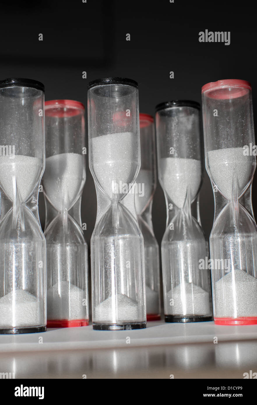 Numerous Hourglasses With Running Sand Stock Photo - Alamy