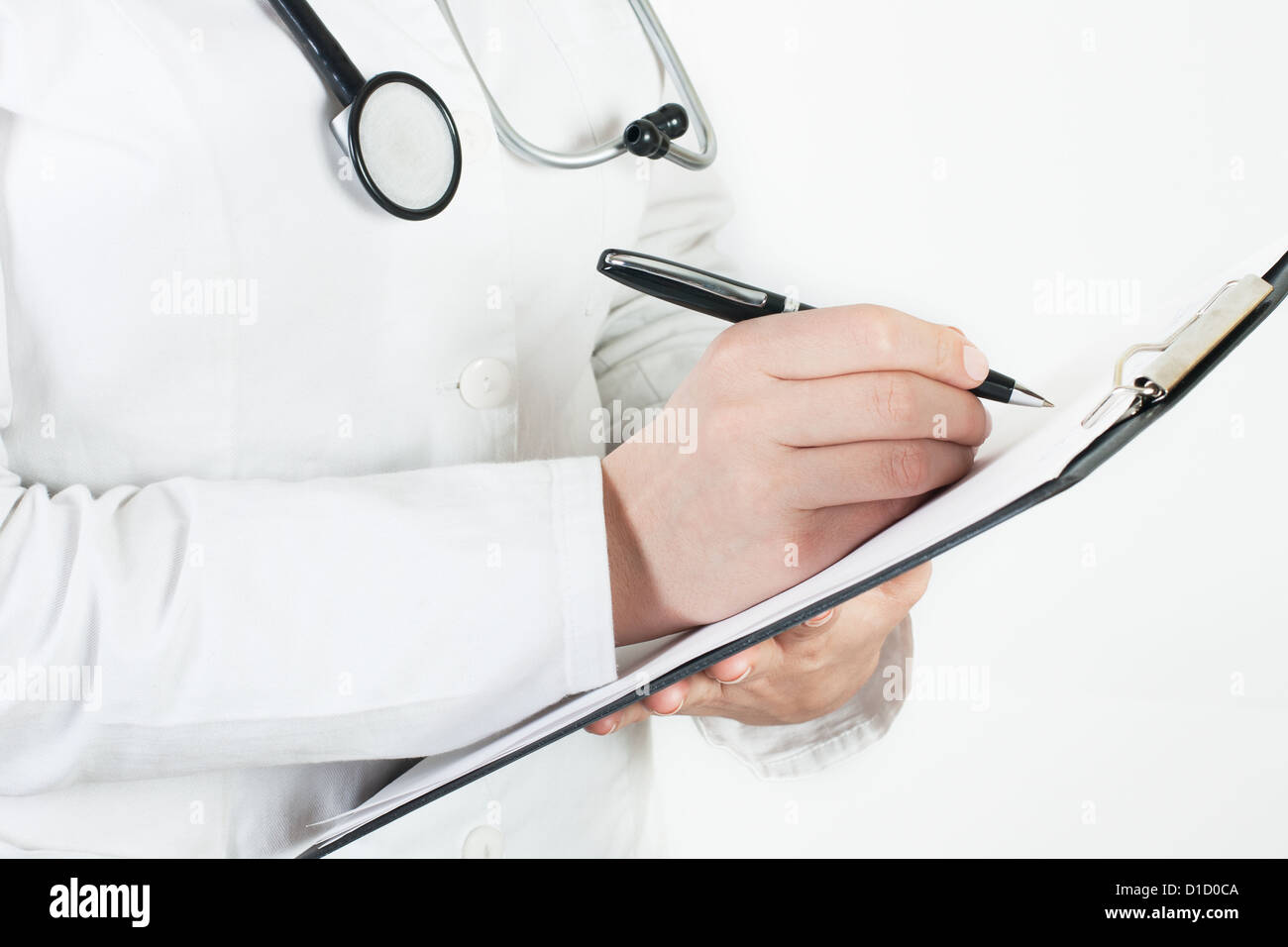 Closeup of medical doctor writing Stock Photo - Alamy