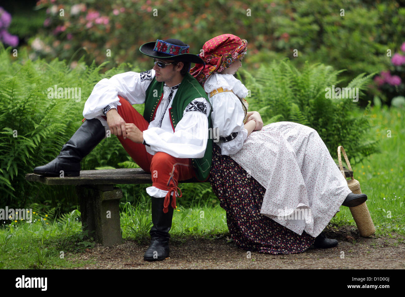 Man and woman in folk costume on a bench Czech Republic folklore Stock ...