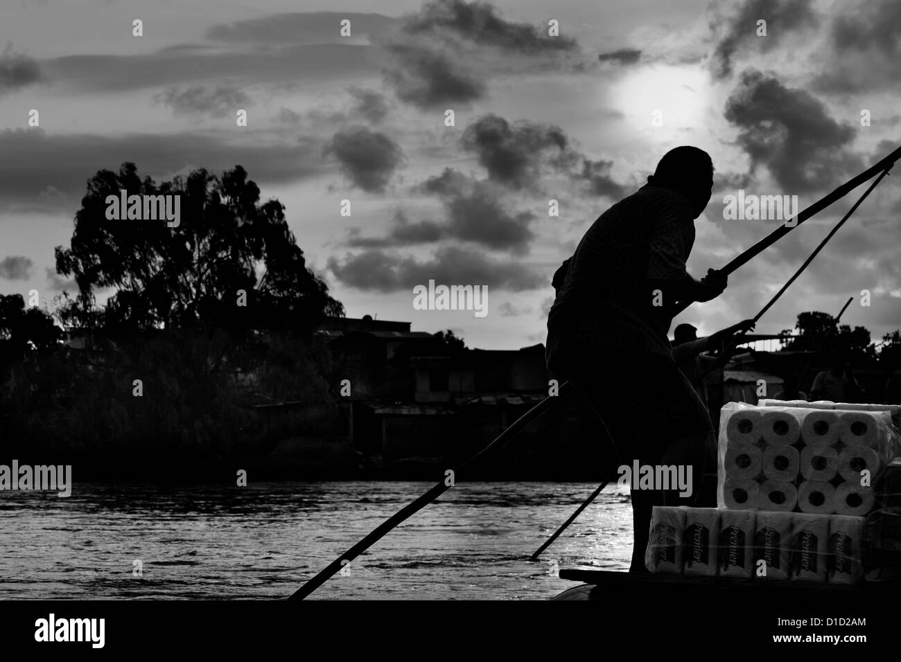 A makeshift inner tube raft, loaded with smuggled toilet papers ...