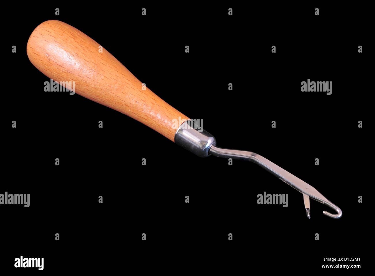 Rug Making Latchet Hook on black background Stock Photo - Alamy
