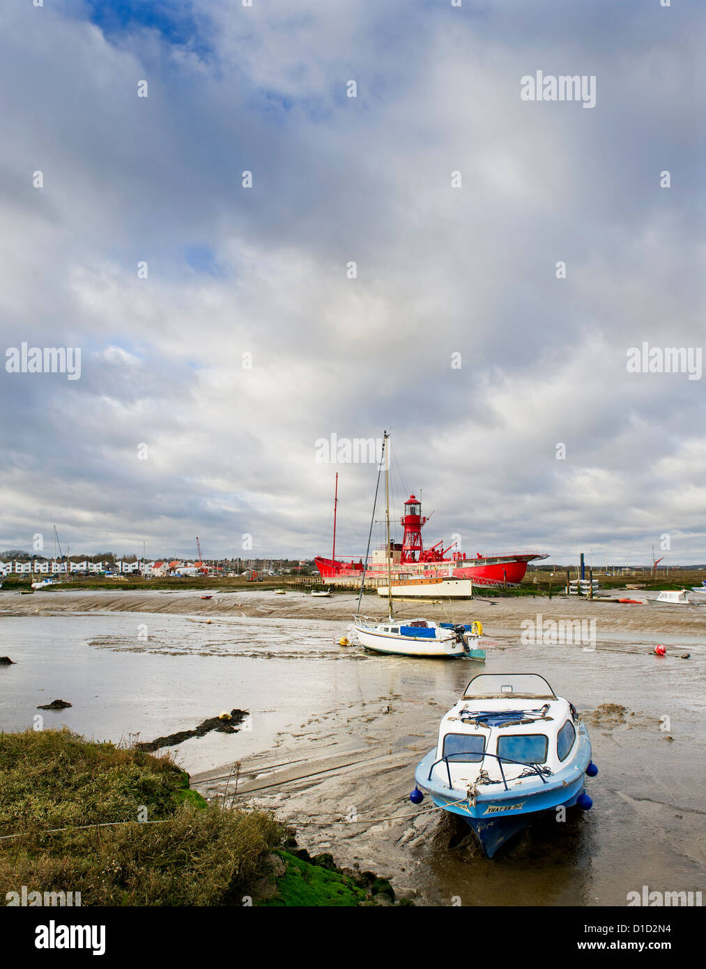 Low tide at Tollesbury Saltings with the retired lightship Trinity in ...