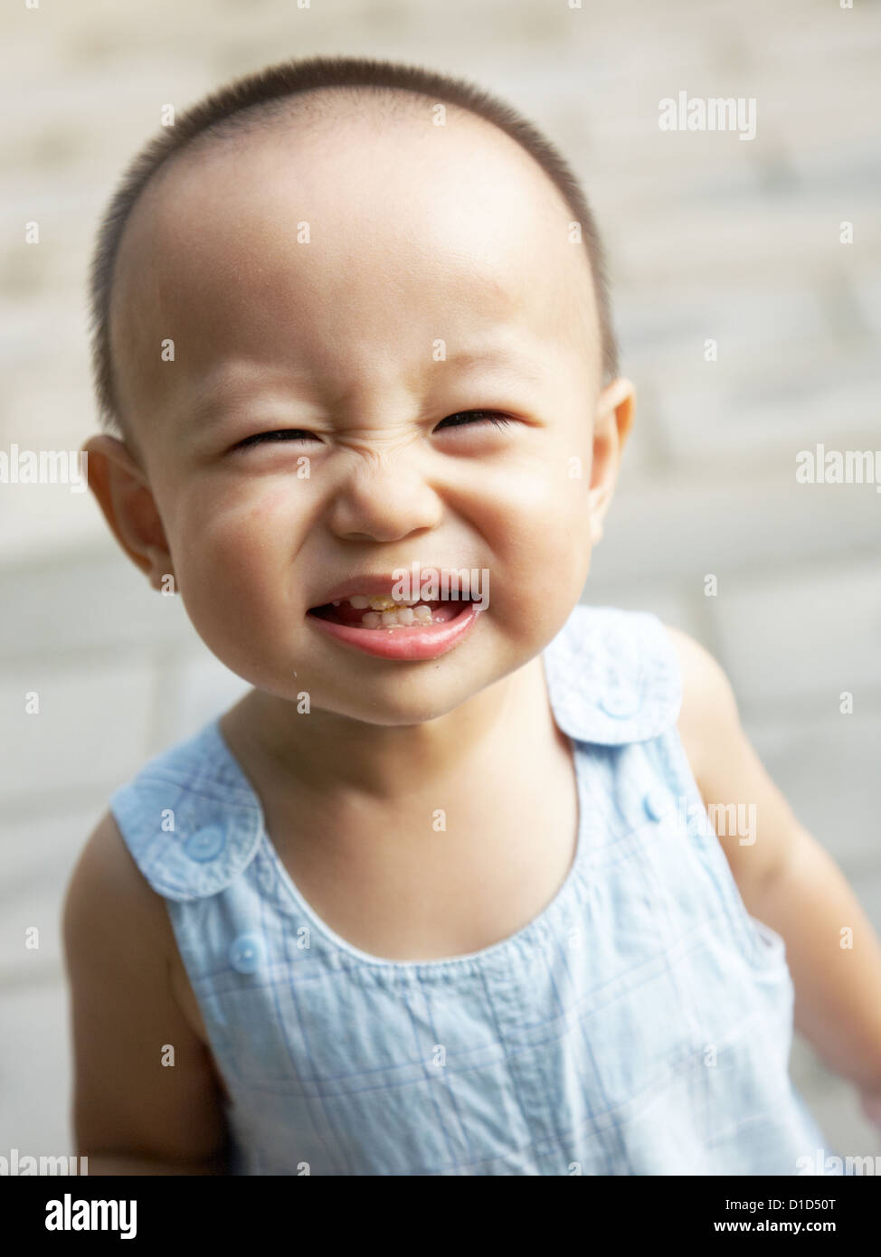 Baby smiling in front of camera Stock Photo - Alamy