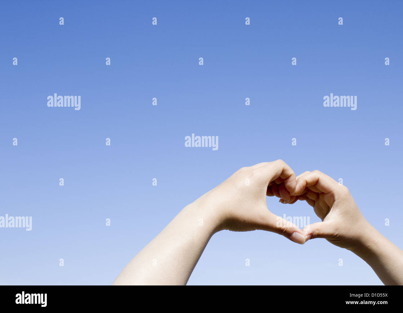 Hands making a heart shape Stock Photo - Alamy
