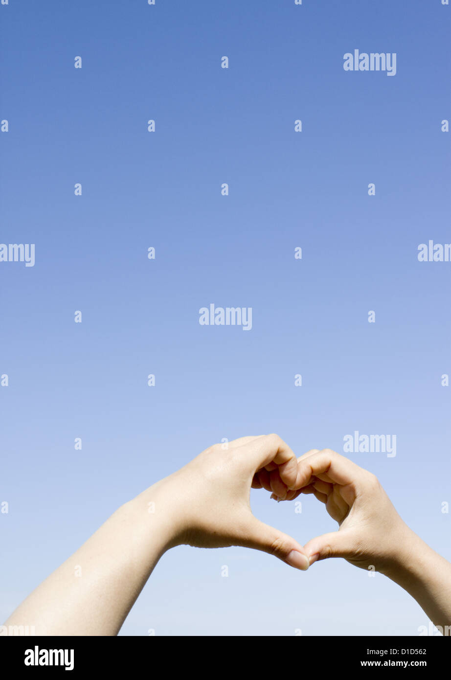 Hands making a heart shape Stock Photo - Alamy