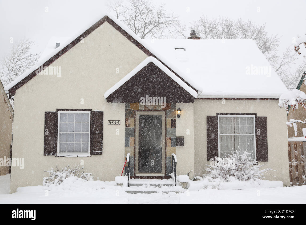 A house in Minneapolis in a snow storm Stock Photo - Alamy