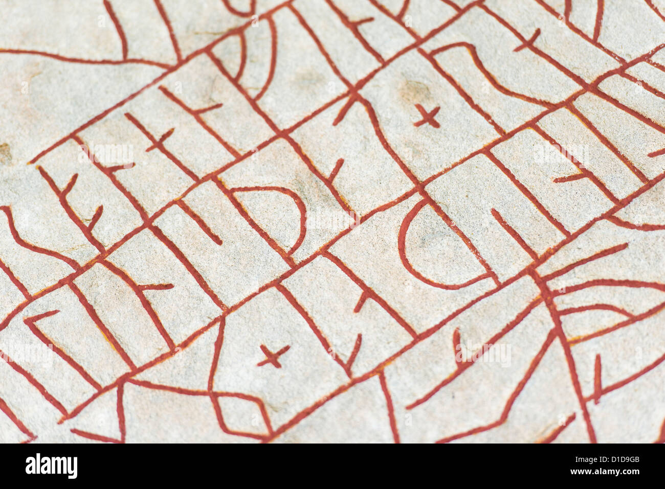 Old historic nordic runes engraved in stone. The stone is located at ...