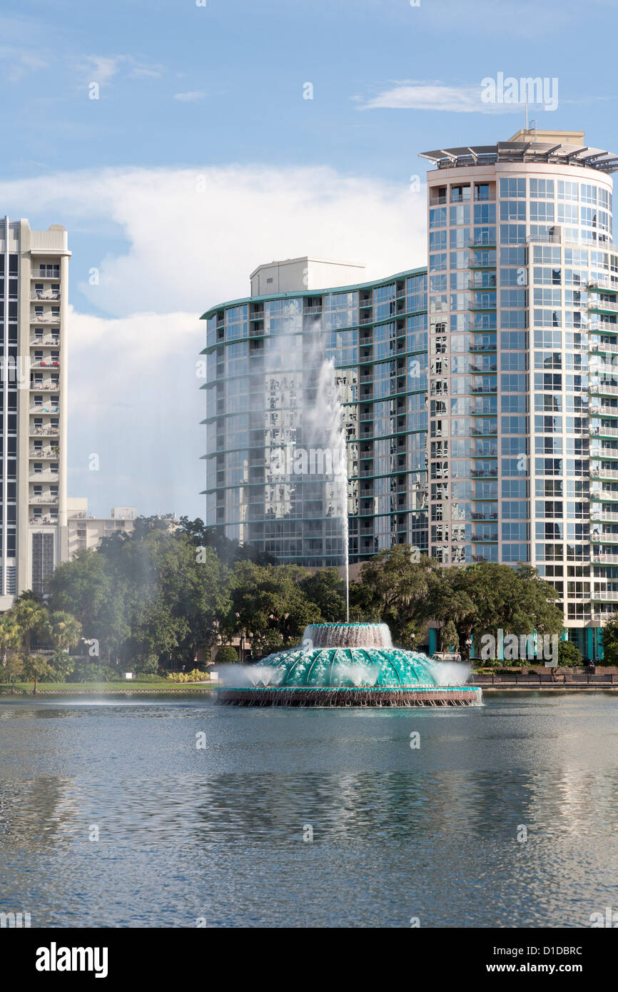 Modern high-rise buildings behind fountain in Lake Eola in downtown ...