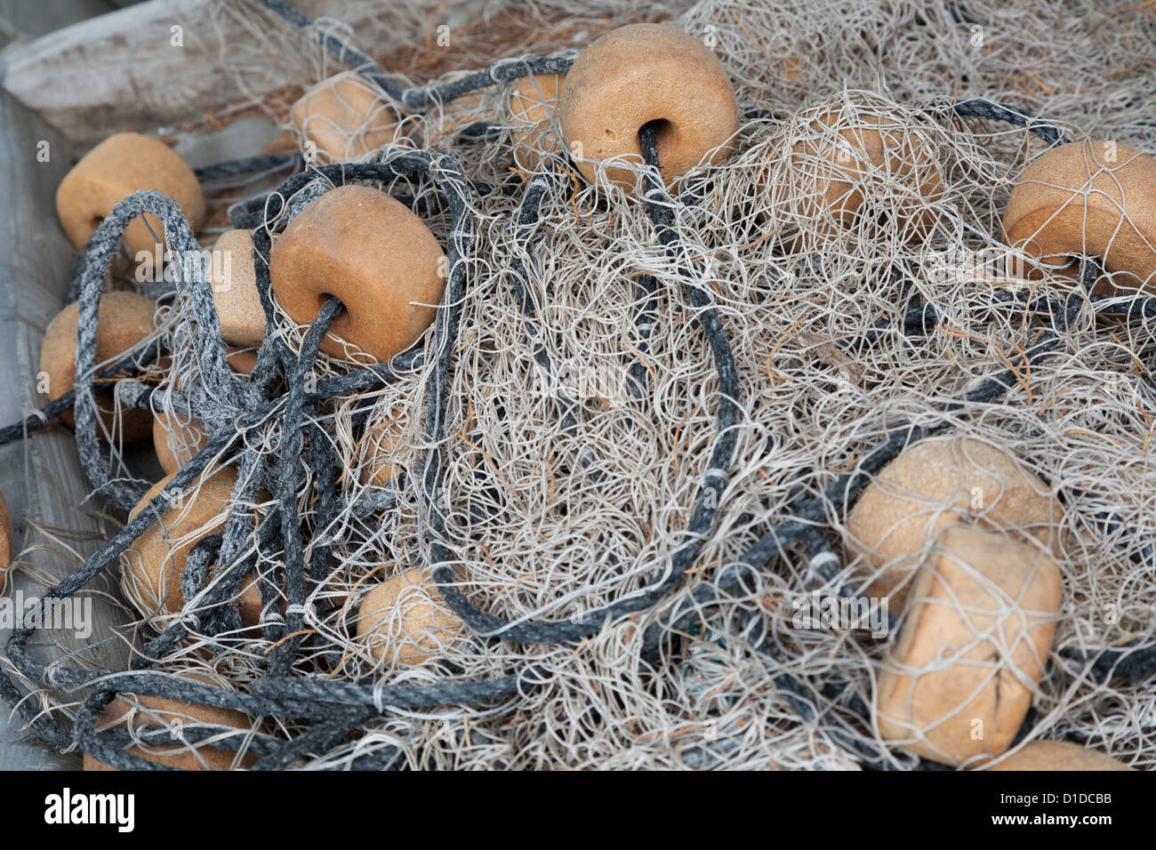 Close-up of fishing net with floats Stock Photo - Alamy