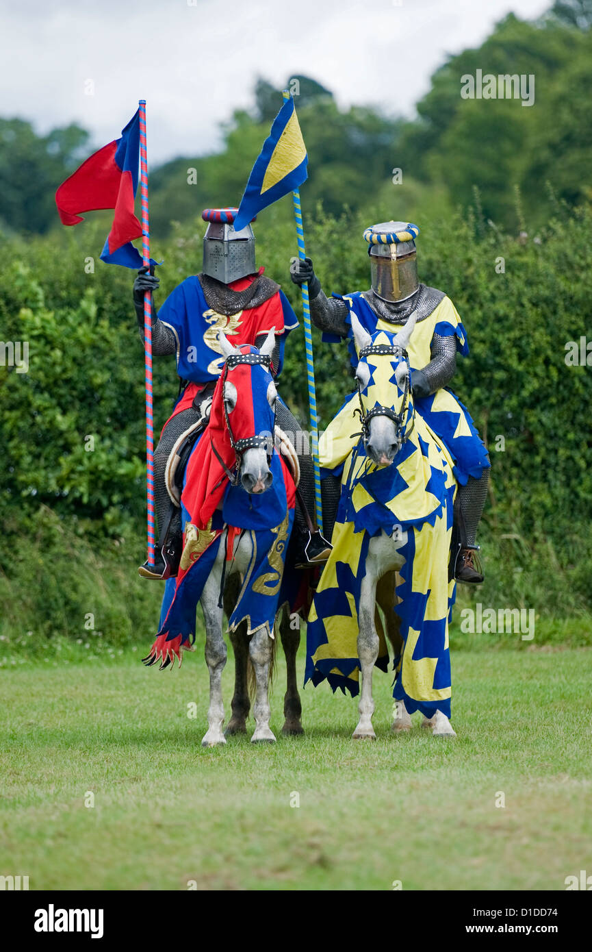 Two knight holding flags Stock Photo - Alamy