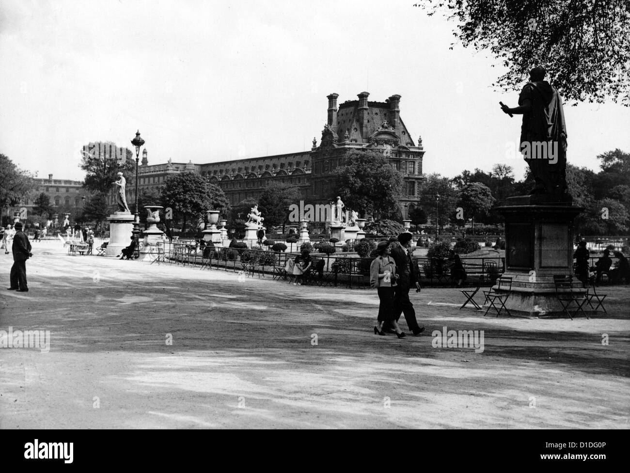 View of the Palais du Louvre through the Tuileries Garden on the day of ...