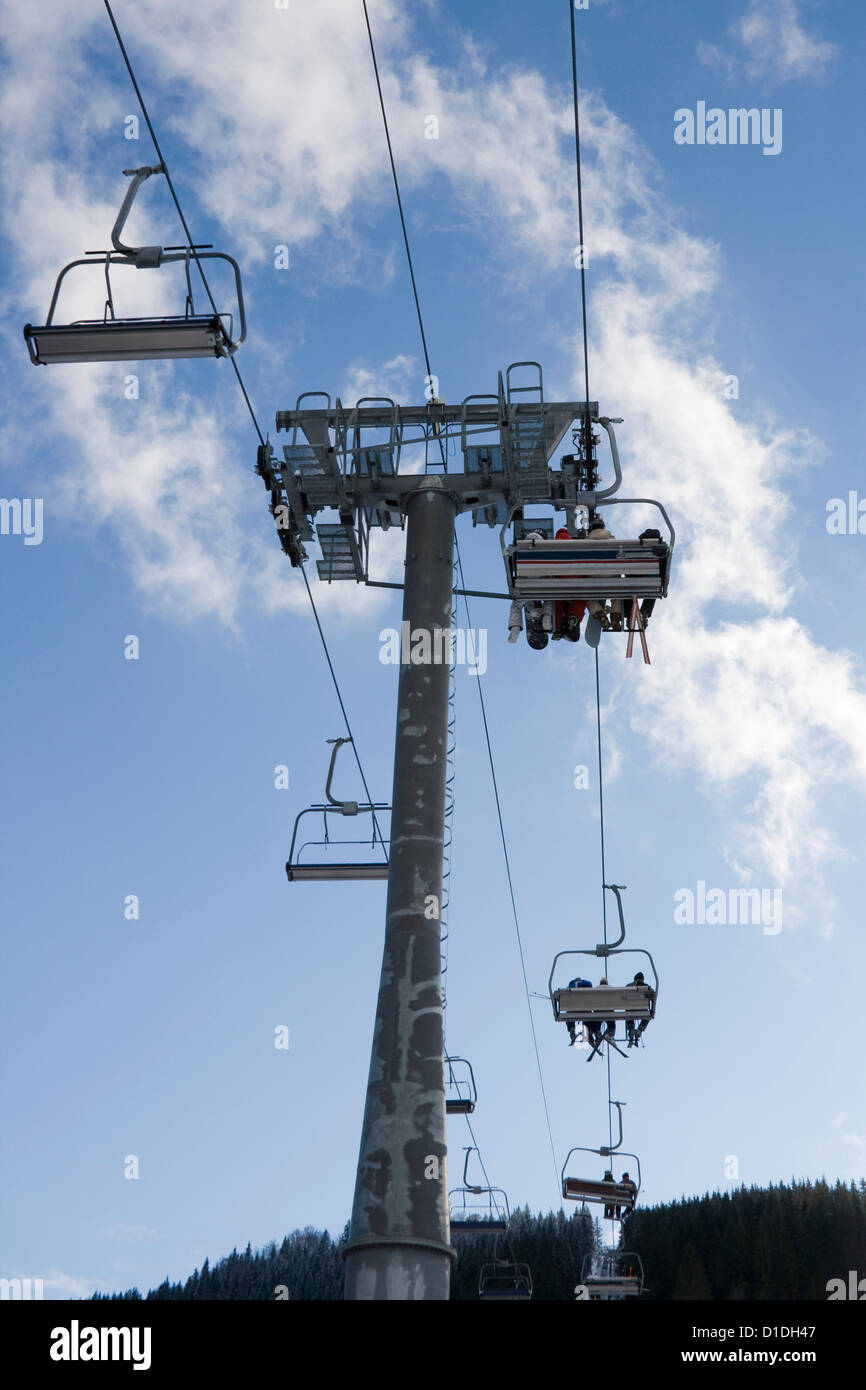 Skiing chair lift on winter resort Stock Photo - Alamy