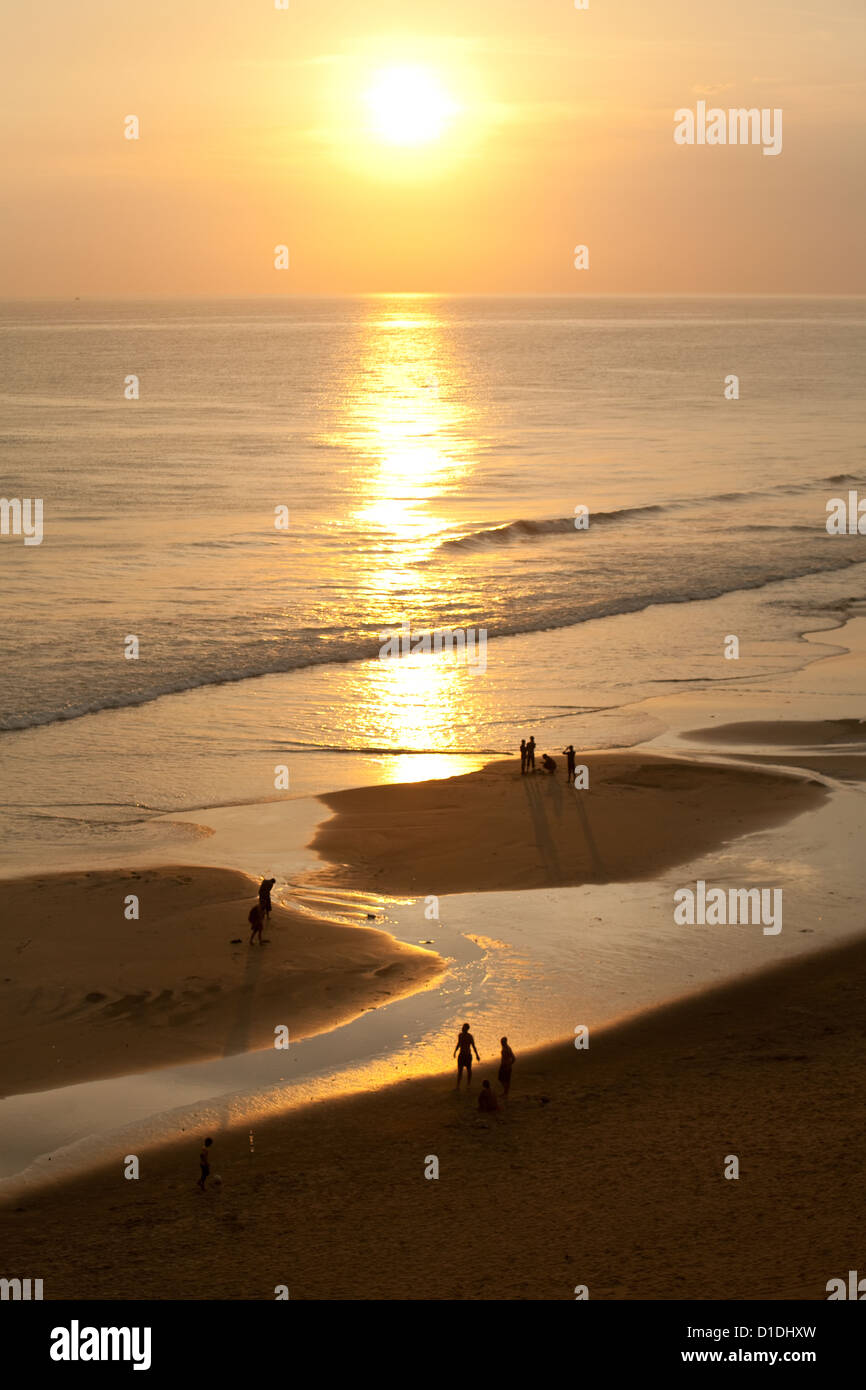 Sunset on Varkala beach in Kerala Stock Photo - Alamy