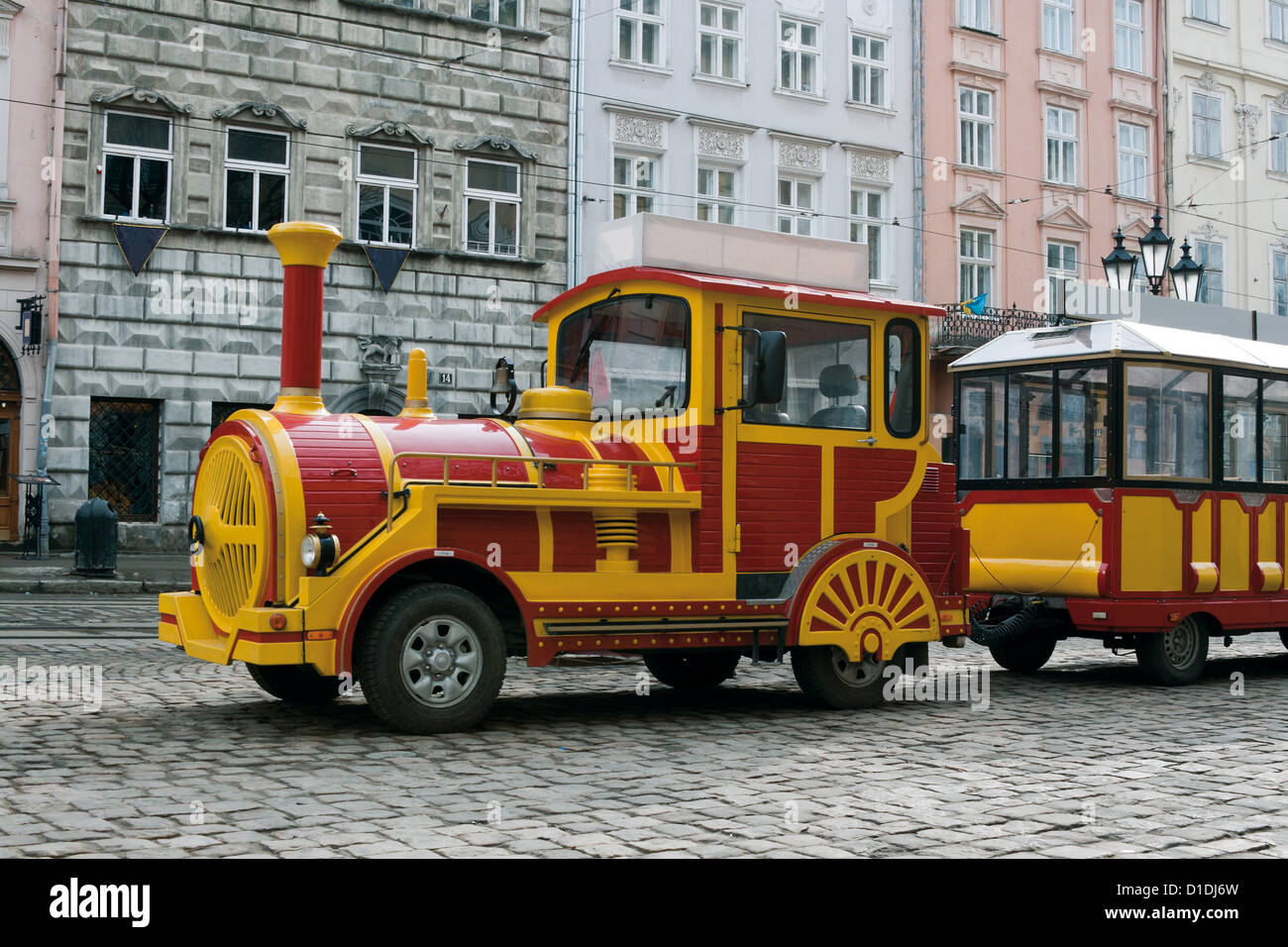 Sightseeing car decorated like a tourist train on Market Square in Lviv ...