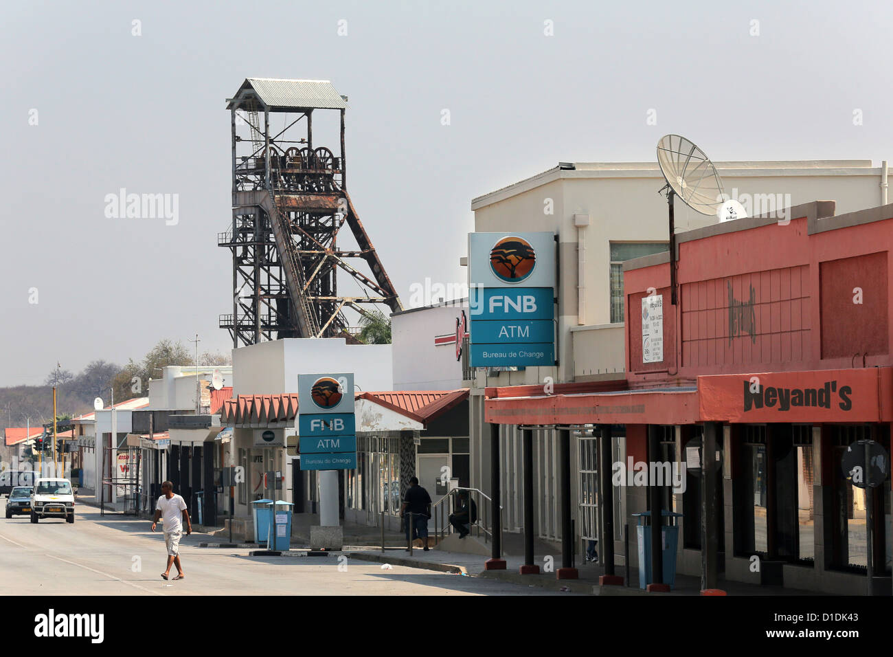 Tsumeb, Namibia. President street with shaft tower of the former copper ...