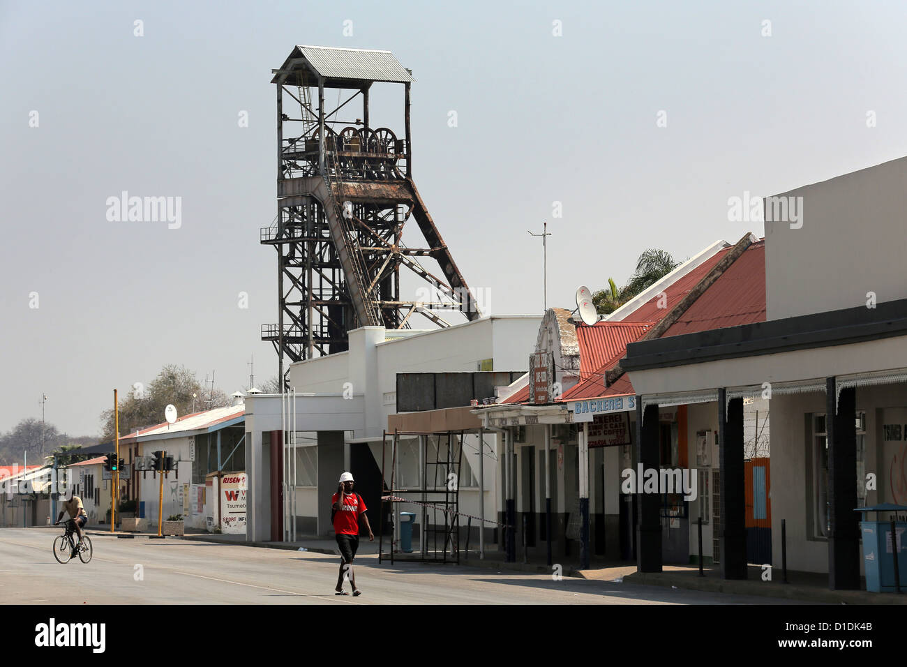 Tsumeb, Namibia. President street with shaft tower of the former copper ...