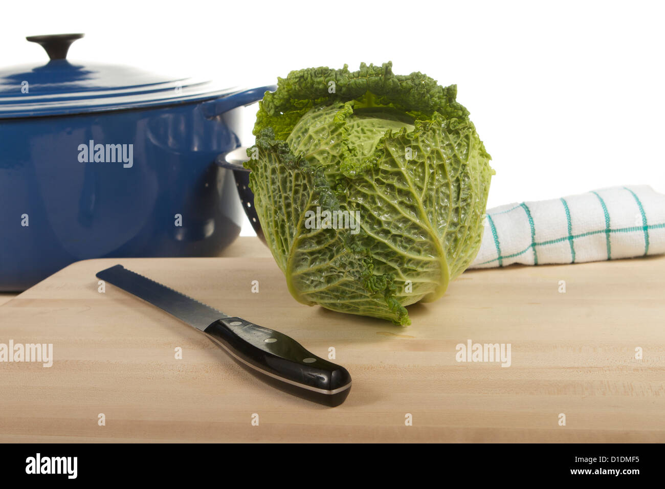 Fresh Savoy Cabbage on a cutting board in a kitchen Stock Photo - Alamy
