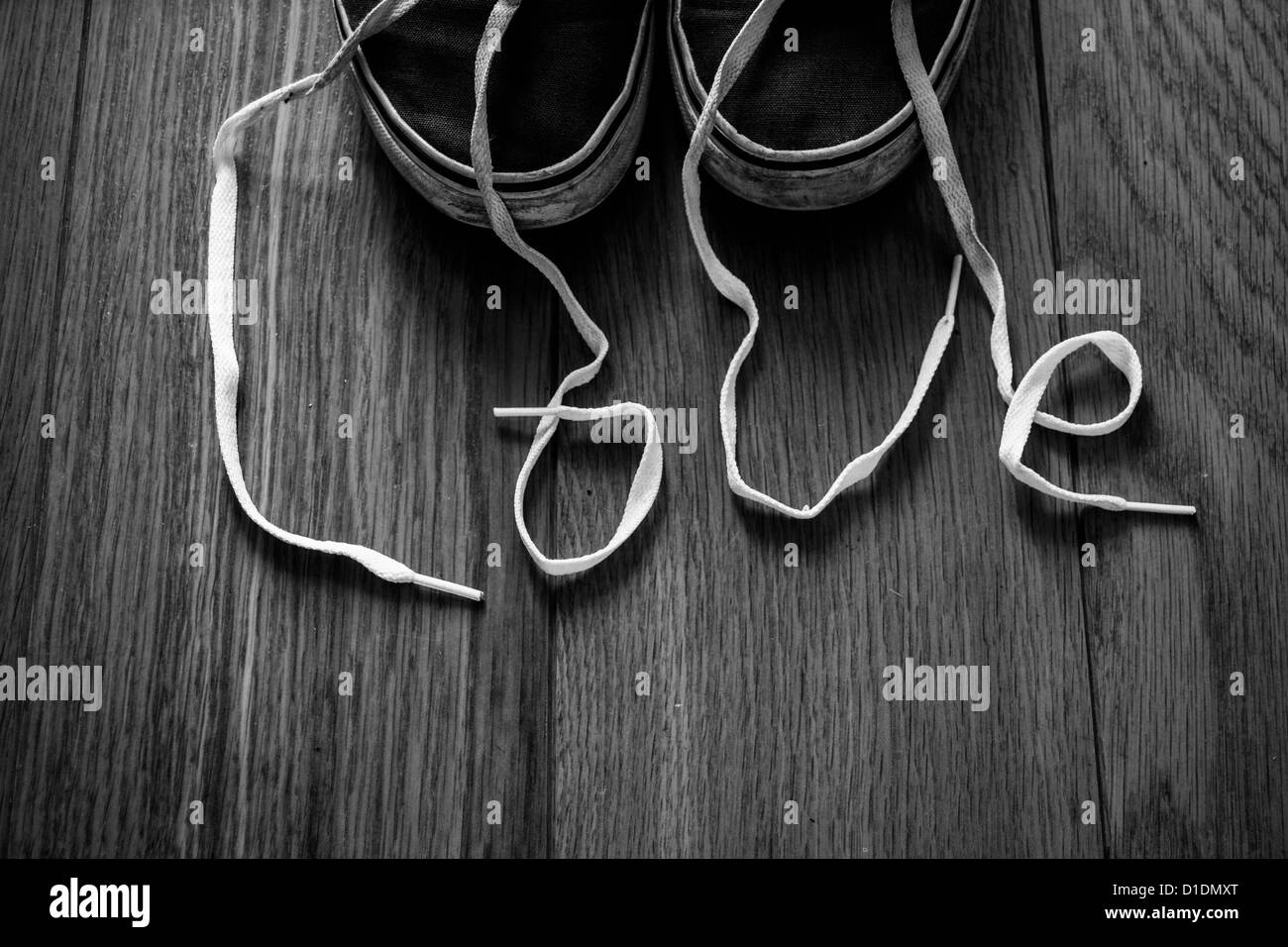 shoe laces spelling out love Stock Photo - Alamy