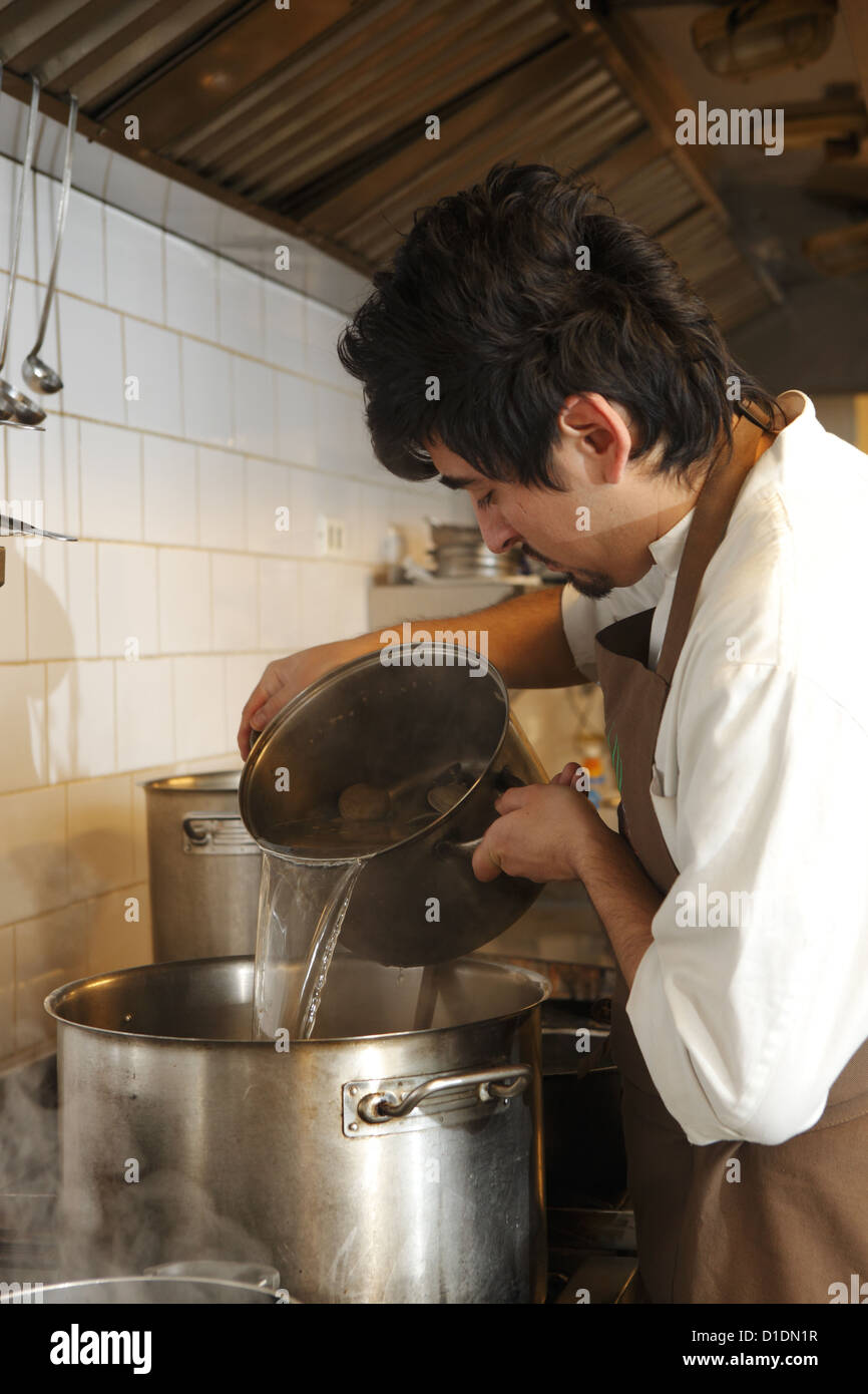 Chef at work in the kitchen of Restaurant Boragó in Santiago, Chile ...
