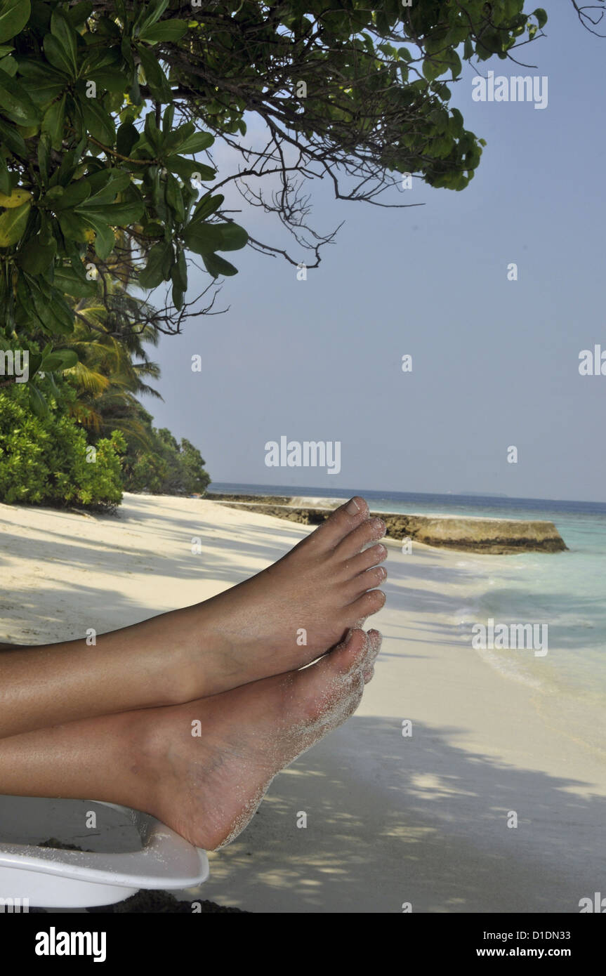 Tropical beach feet hi-res stock photography and images - Alamy