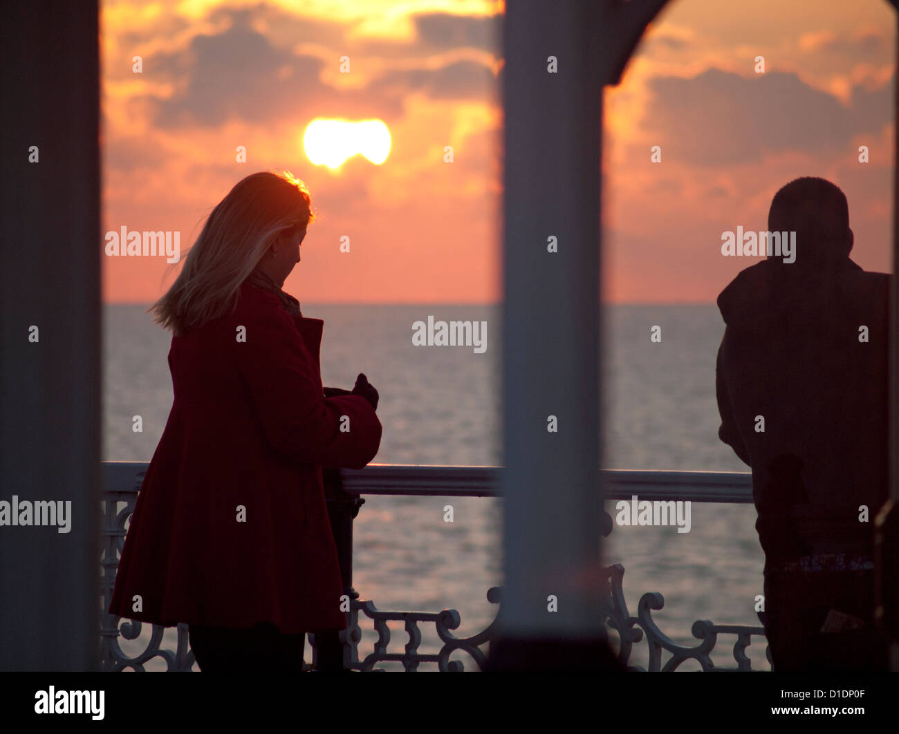 The sun going down, as seen from Brighton Pier Stock Photo - Alamy
