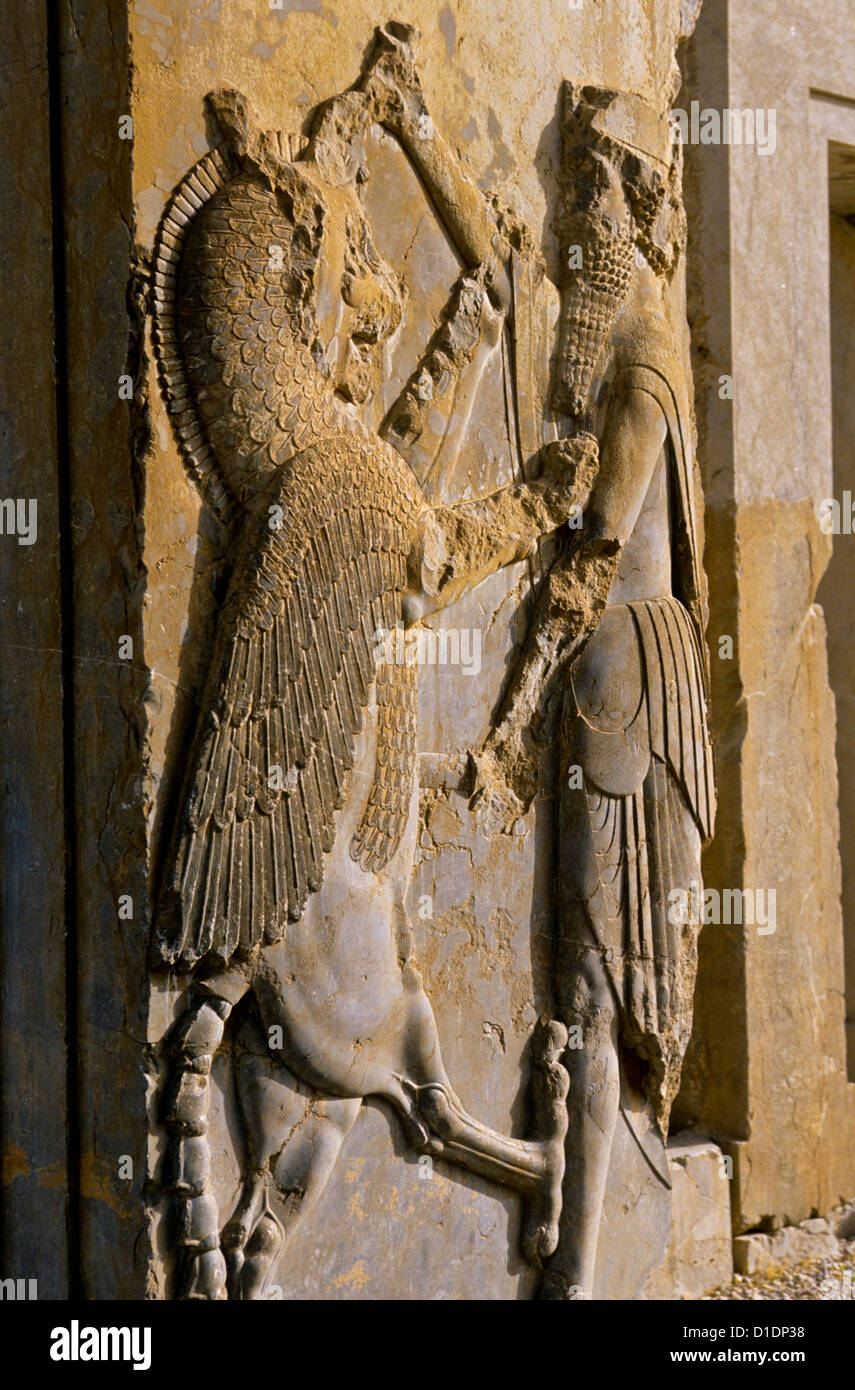 Bas-relief of a fighting warrior and lion at the archaeological site of ...