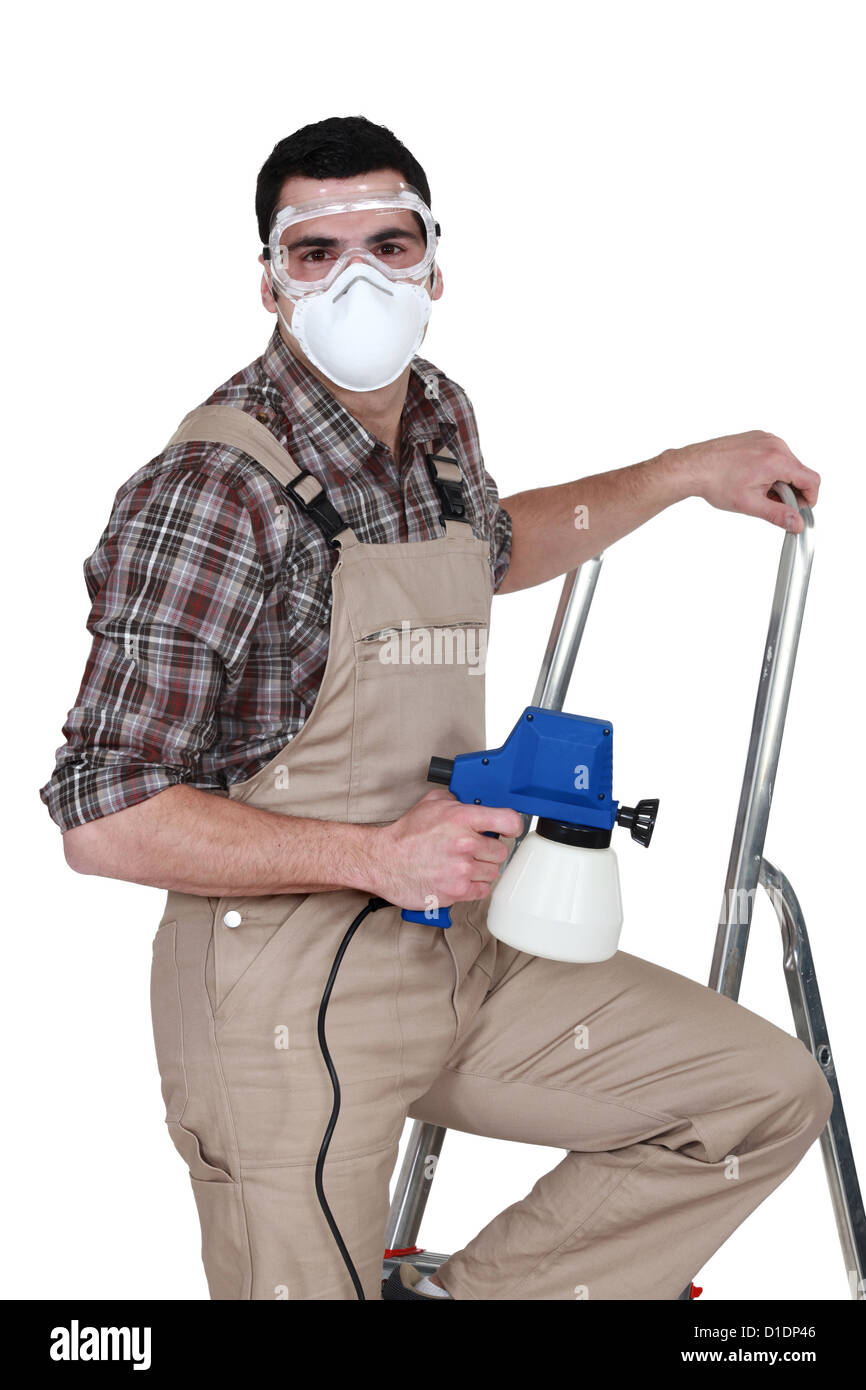 Plumber climbing a ladder Stock Photo - Alamy