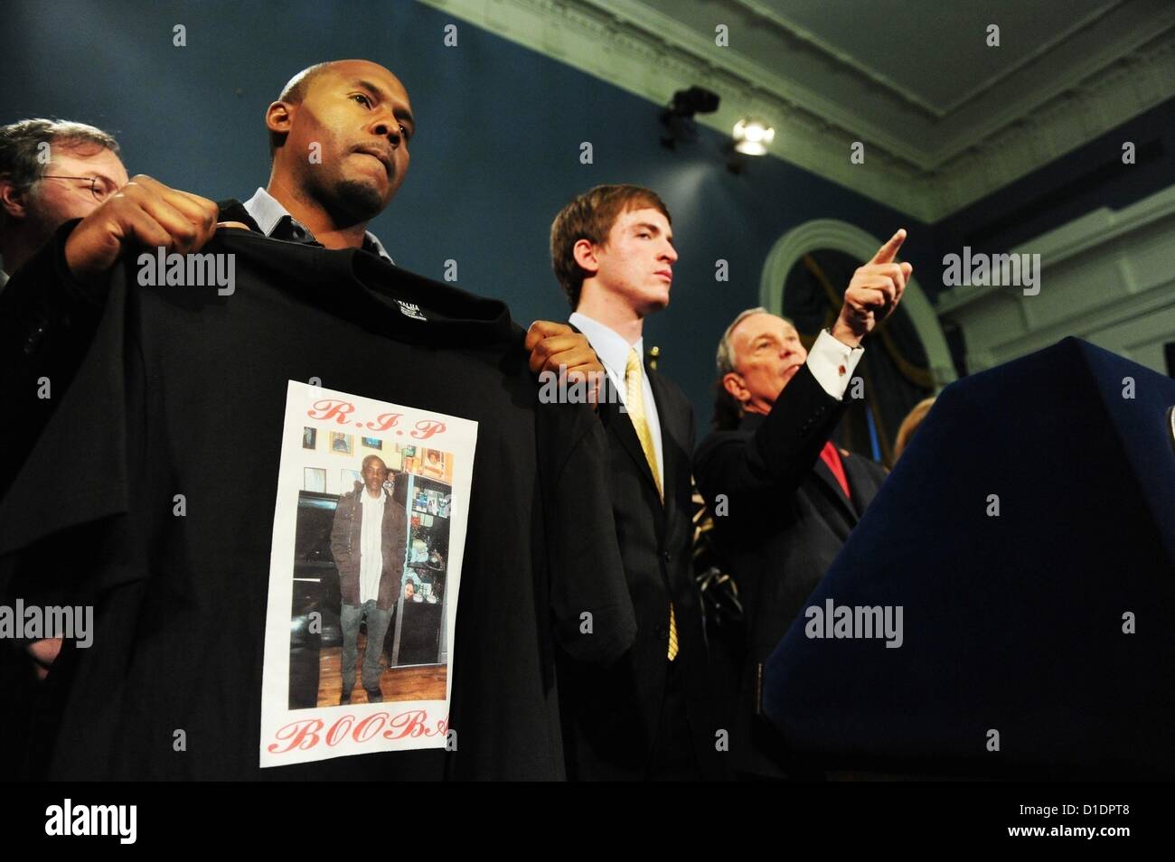 Dec. 17, 2012 - Manhattan, New York, U.S. - Chris Foye holds a shirt ...